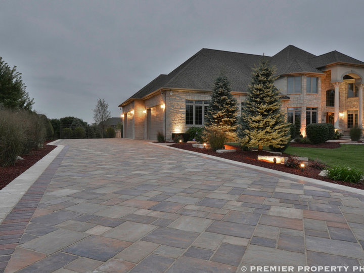 Design ideas for a huge contemporary front yard concrete paver driveway. - J.T. Williams