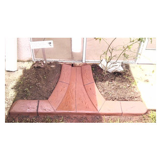 integrated splash blocks into curb to allow water drainage from down ...