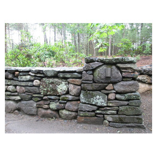 New England fieldstone wall with battered pier and low voltage lighting ...