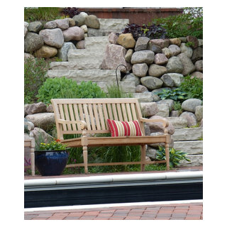 Pool side bench seating with boulder retaining wall - Country - Garden ...
