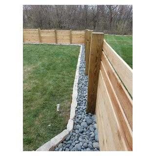 Rock and stone edging around fence - Landscape - Kansas City - by ...