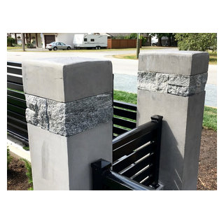 Stone inlay set into the front fence posts - Modern - Landscape ...