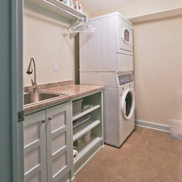 75 Beautiful Utility Room with a Stacked Washer and Dryer Ideas and ...