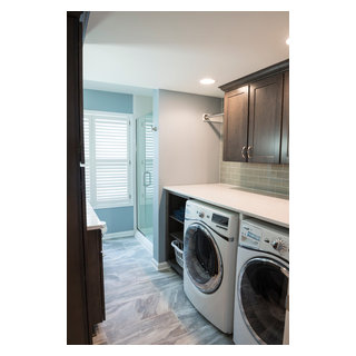 Traditional Laundry Room with Porcelain Floor Tile and Dark Wood ...