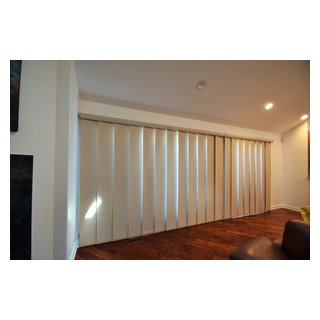 Hunter Douglas Skyline® Gliding Window Panels in Living Room of ...