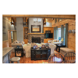 Living area in a rustic but traditional log and timber home ...