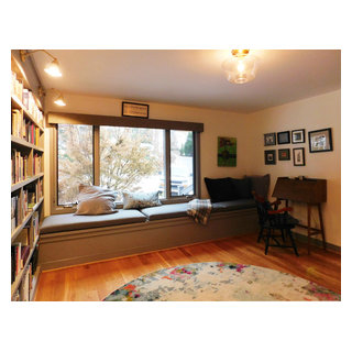 Modern Library Shelves with Integrated Lighting and a Window Seat ...
