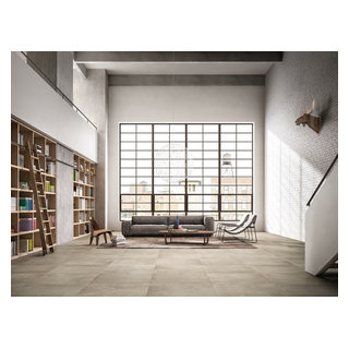 Modern living room library with large cement look porcelain tile ...