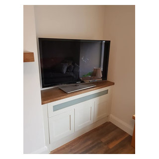Two fitted alcove units with floating shelving floating mantle ...