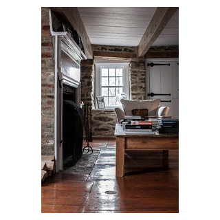 Vintage barn frame addition to Dutch stone house - Classique - Salon ...