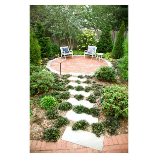 Cobbled edge brick circle mini-patio - Transitional - Patio - Boston ...