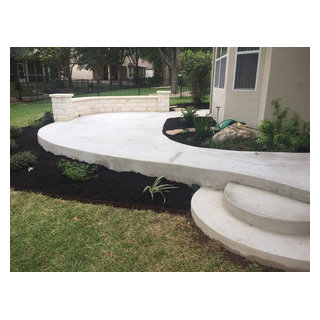 Concrete patio w/ limestone seatwalls and columns - Traditional - Patio ...