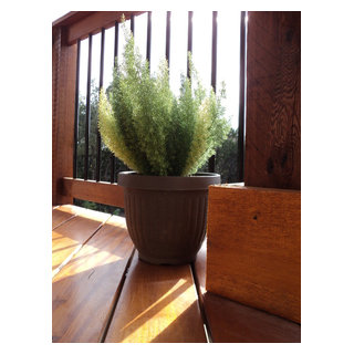 Garapa decking with Oklahoma stone patio and Cedar Pergola ...