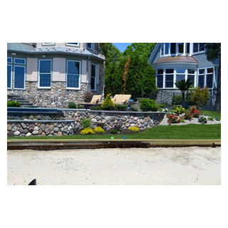 Infinity Edge Pool, Cultured Stone, Pool Deck - Beach Style - Patio ...