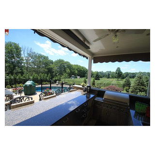 Kidney shaped in-ground salt water pool with outdoor kitchen ...