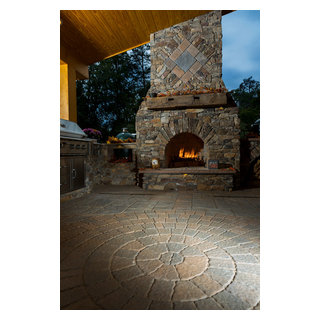 Outdoor fireplace with grill island and big green egg - Rustic - Patio ...