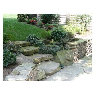 Outdoor flagstone patio with dry stack seat wall - Rustic - Landscape ...
