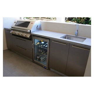 Outdoor Kitchen with a polished concrete benchtop & stainless steel ...