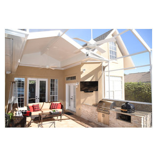 Outdoor kitchen with extended roof and screen enclosure - Traditional ...