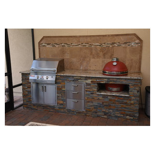 Outdoor kitchen with Solaire gas grill, Kamado Joe, patio and fire pit ...