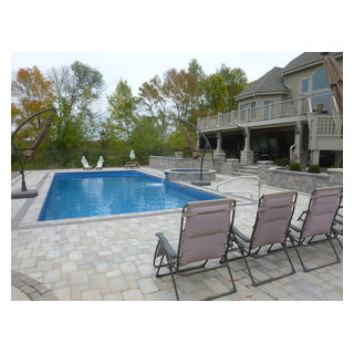 18' x 40' Inground Swimming Pool with Stone Pavers & Retaining Walls ...