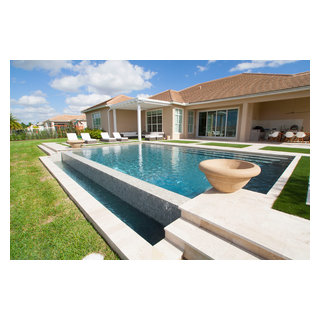 Big Pool with Infinity Edge and Custom Water Bowls in Davie, Florida ...