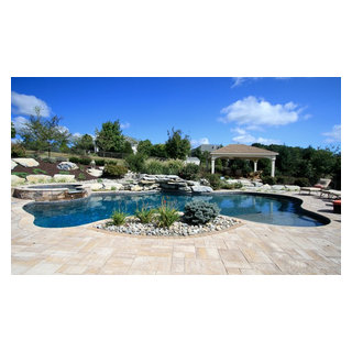 Custom Freeform style salt water in ground pool with Pool House and ...