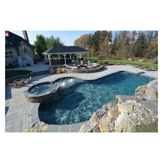 Custom Freeform style salt water in ground pool with Waterslide and Spa ...