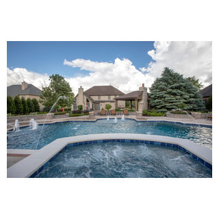 Elgin, IL Roman End Pool with Freeform Hot Tub - Mediterranean - Pool ...
