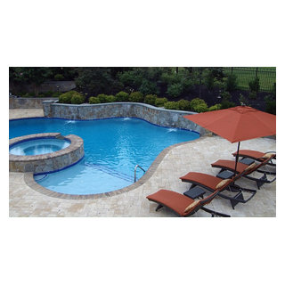 Freeform Pool with Raised Bond Beam and Sheer Descents - Piscine ...
