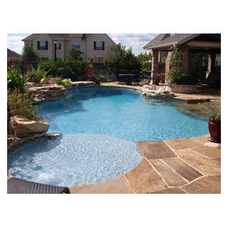 Freeform Pool with waterfalls, beach entry & sunshelf - Traditional ...