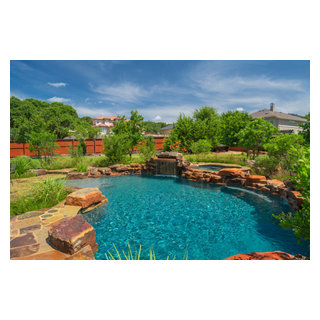 Freeform pool with weeping wall, grotto, and spa in San Antonio, Tx ...