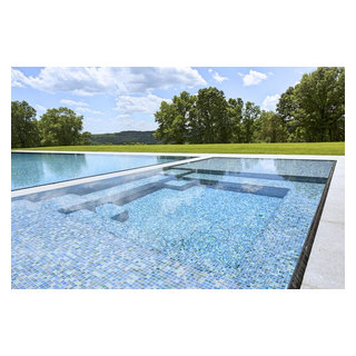 glass tile swimming pool + spa with perimeter overflow + granite ...