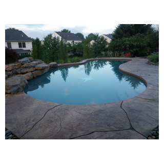 Hanover Township custom pool with boulder waterfall - Traditional ...