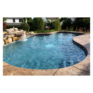 Hanover Township custom pool with boulder waterfall - Traditional ...