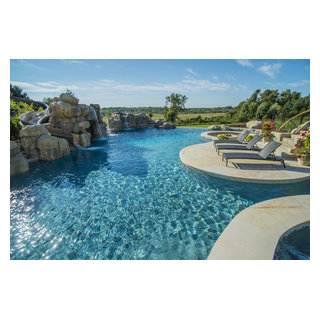 Infinity Edge Pool with Island, Slide, Waterfalls, and Spa - Pool ...