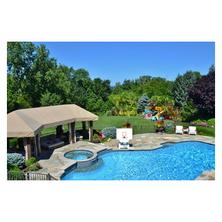 Kid Friendly Tropical Poolside Backyard - Traditional - Pool - Newark ...