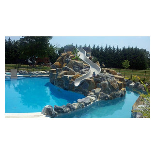 Large Pool with boulder waterfall ,water slide and a lazy river ...