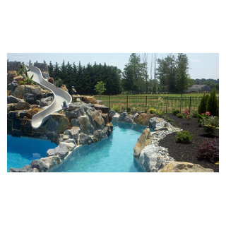 Large Pool with boulder waterfall ,water slide and a lazy river ...