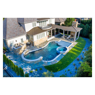 Naperville, IL freeform swimming pool with hot tub, large sunshelf ...