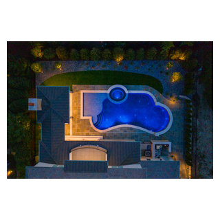 Naperville, IL freeform swimming pool with hot tub, large sunshelf ...