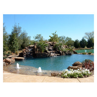 Natural Beach Entry Freeform Pool with slide, table and cascading ...