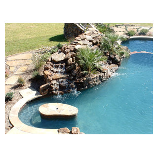 Natural Beach Entry Freeform Pool with slide, table and cascading ...