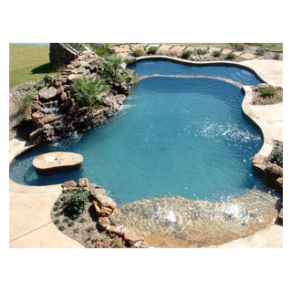Natural Beach Entry Freeform Pool with slide, table and cascading ...