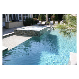 Pool and Spa with 360 degree spa spillover, two sun shelfs, raised ...