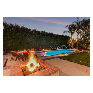 Pool with Creative Tile Details at Twilight - Classique Chic - Piscine ...