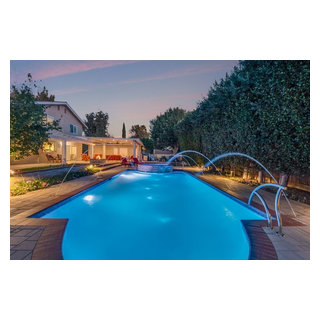 Pool with Creative Tile Details at Twilight - Transitional - Pool ...