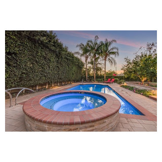 Pool with Creative Tile Details at Twilight - Transitional - Pool ...
