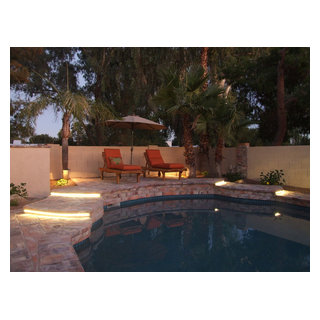 Raised deck with LED ribbon lighting at steps. - Mediterranean - Pool ...