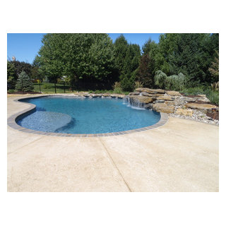 Salisbury Township custom pool with waterfall and sunshelf ...